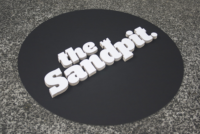 the Sandpit. Cardboard sign by Mat Bogust at Coroflot.com