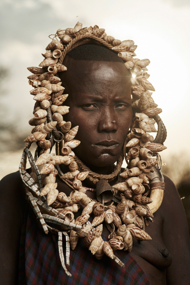 Mursi beauty. by Adam Koziol at Coroflot.com