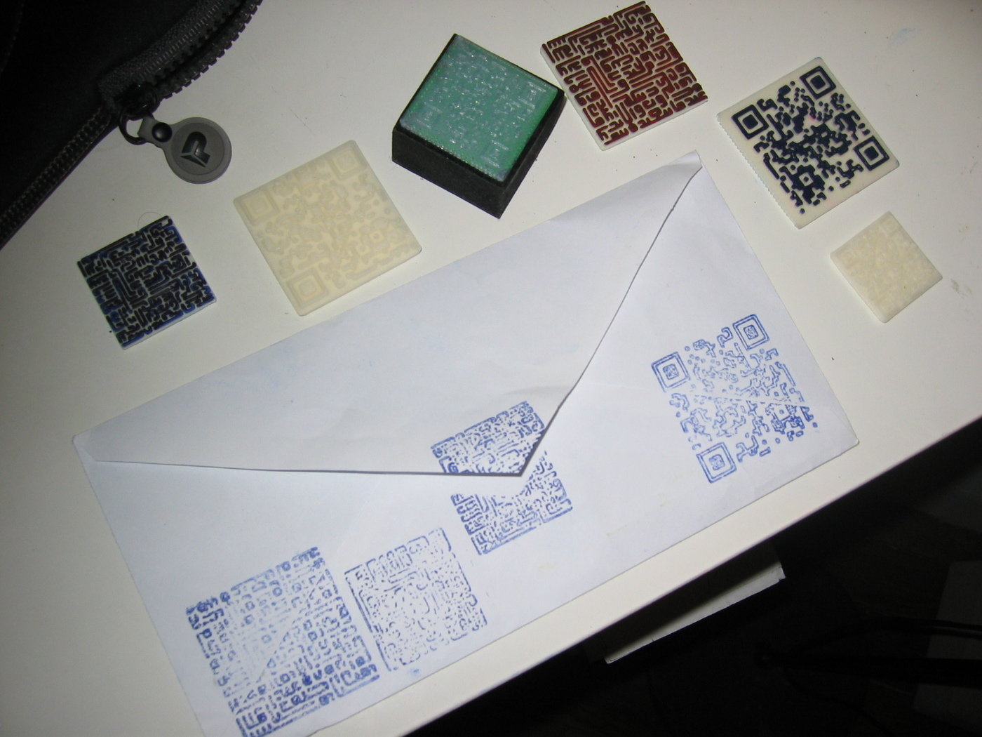 kufik calligraphy and QR code stamps by vincent simoncelli at Coroflot.com