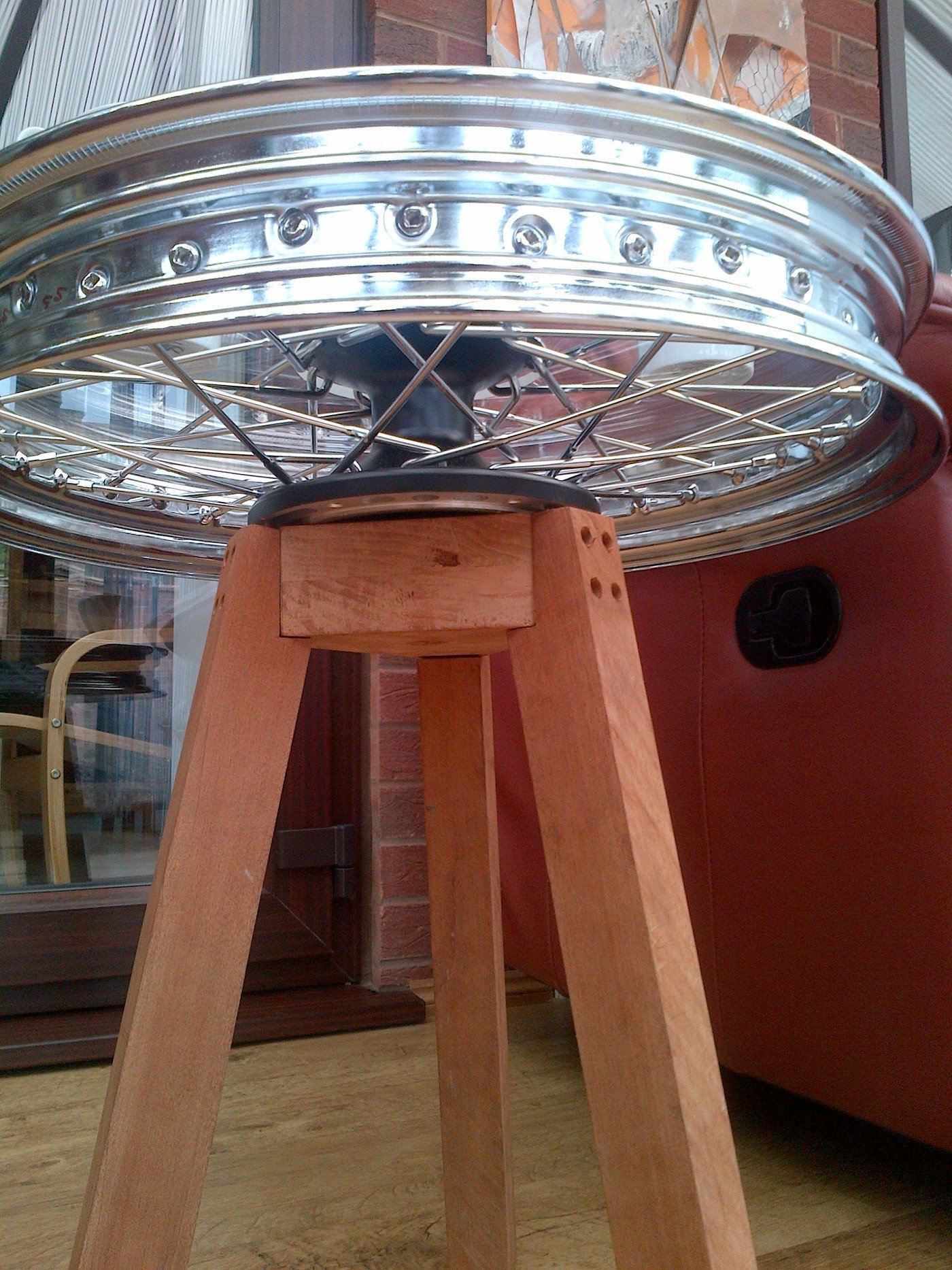 Motorcycle Wheel Side Table by Daniel Beck at Coroflot.com