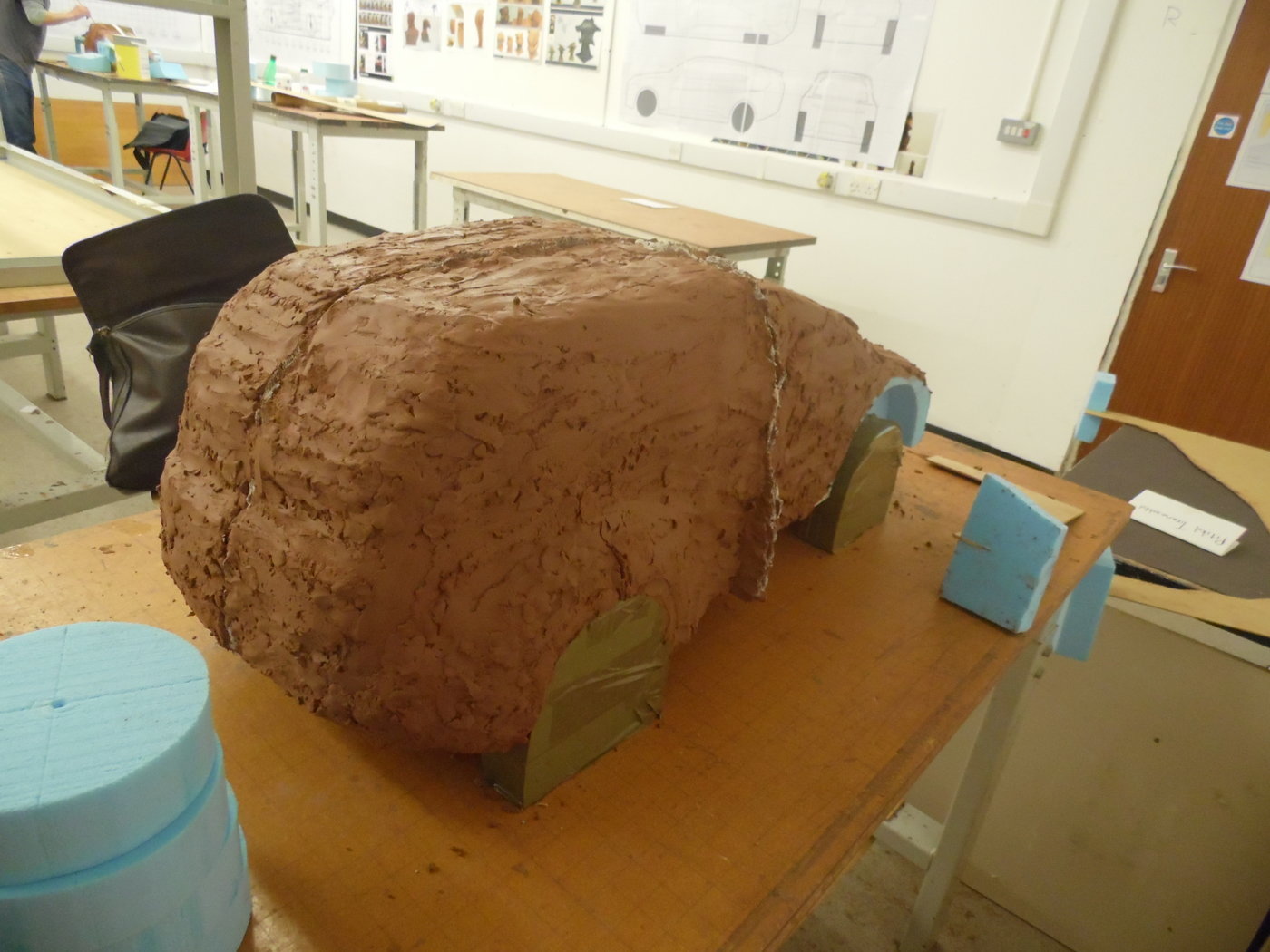Hybrid MPV/Camper clay model by Richard Todd at Coroflot.com