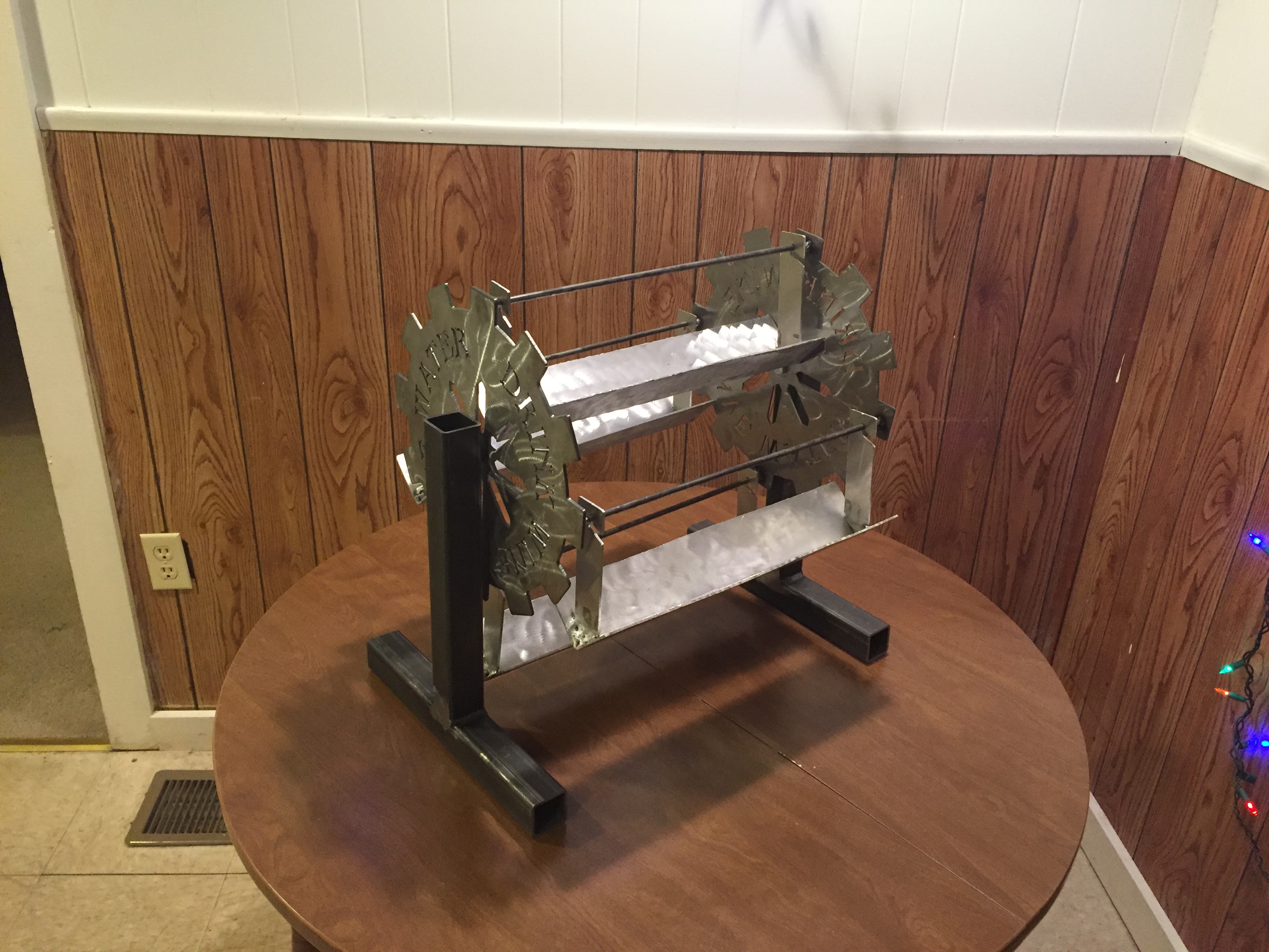 Welding Project: Rotating Wine Rack by James Hertzel at Coroflot.com