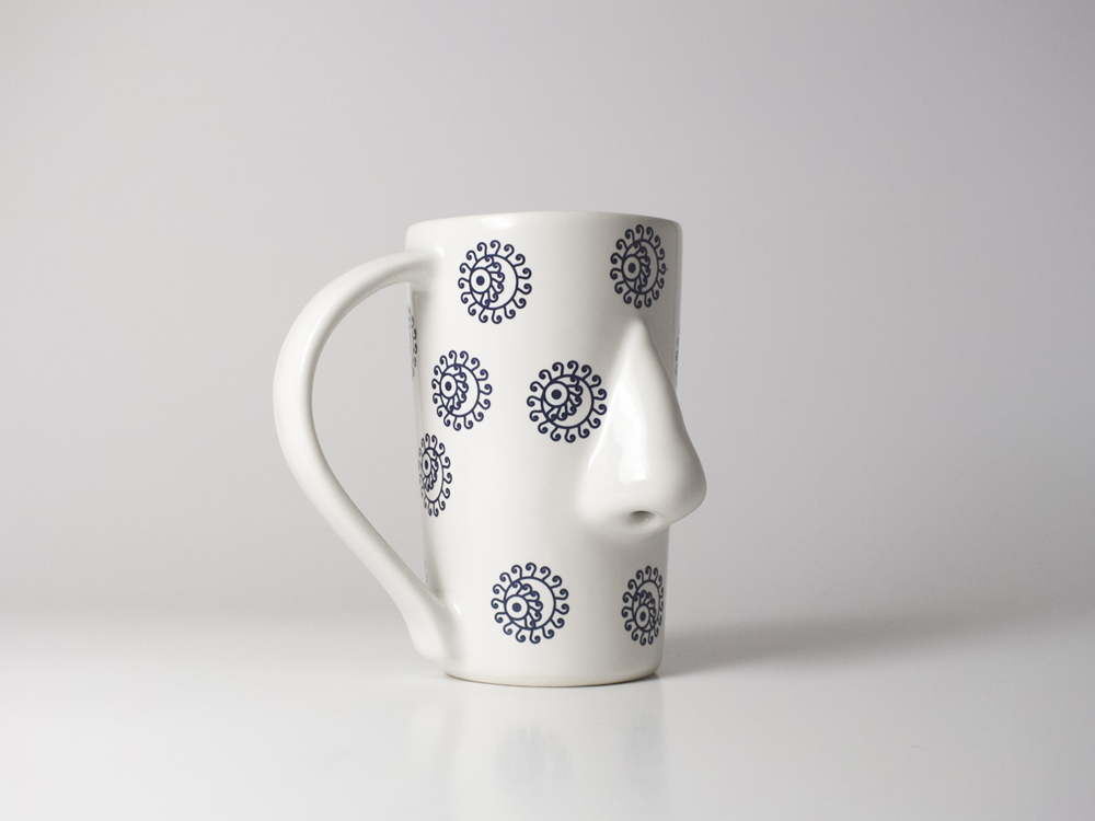Nosy nose mug by Rafael Muciño at Coroflot.com